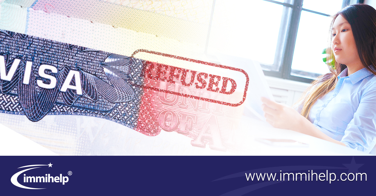 221(g) US visa refusal. Blue, pink, yellow, green, white forms at New ...